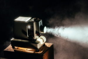 When Were Projectors Invented? History of the Projector - Optics Mag