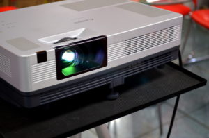 How Do Projectors Work? Everything You Need to Know - Optics Mag