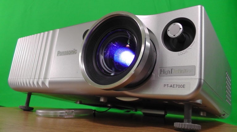 Projector vs TV: Pros, Cons, & What to Choose - Optics Mag