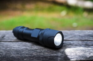 How Does a Flashlight Work? What Are Its Parts? - Optics Mag