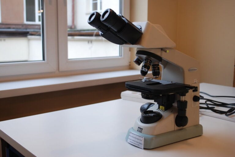 What Is the Proper Way to Carry a Microscope? Tips & FAQ - Optics Mag