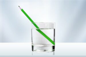 Reflection vs. Refraction: What's the Difference? - Optics Mag